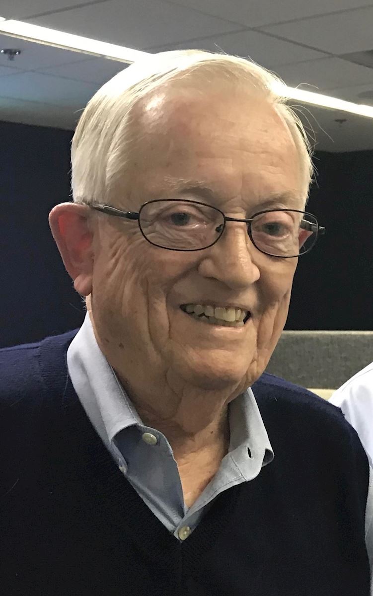 Old man with glasses smiling